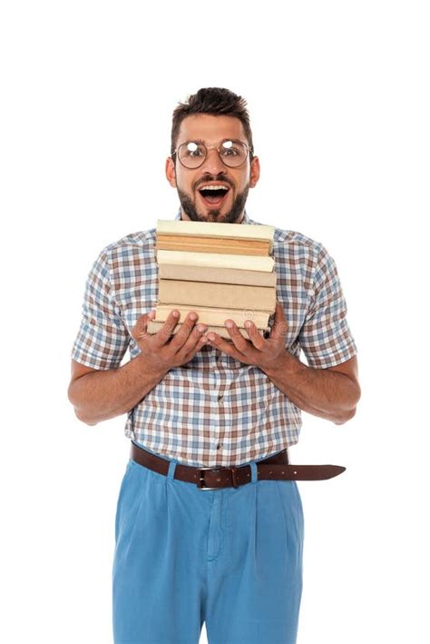 Nerd Holding Books And Looking At Camera Isolated On White Stock Image Image Of Happy