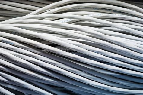 Bunch Of Network Cables In Wave Pattern Leading Across Server Ro Stock