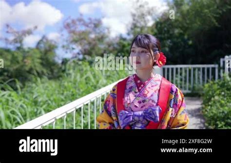 This Captivating Slow Motion Video Features A Young Japanese Woman In Her Twenties Wearing