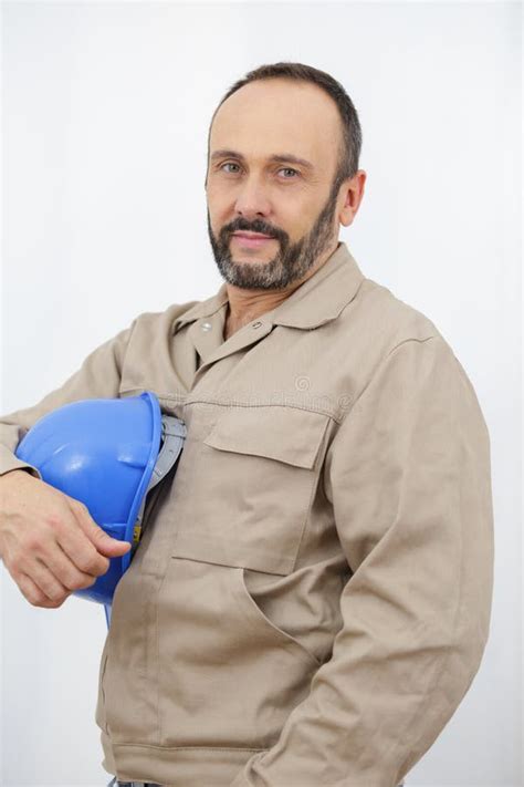 Constructor Masculino En Casco Con Fondo Blanco Foto De Archivo Imagen De Standing