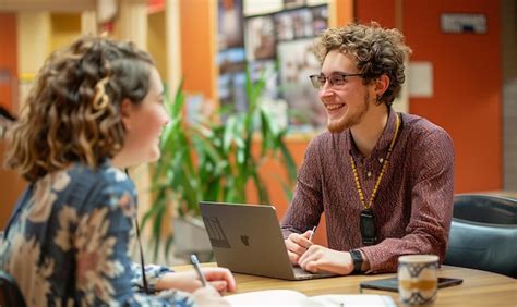 Internship Team Collaborating On Research Paper Premium Ai Generated