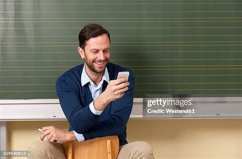 Teacher Texting Photos And Premium High Res Pictures Getty Images