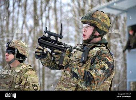 A U S Soldier Assigned To 554th Military Police Company Looks On As A