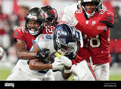 Tennessee Titans Wide Receiver Bryce Oliver Is Tackled By Tampa Bay
