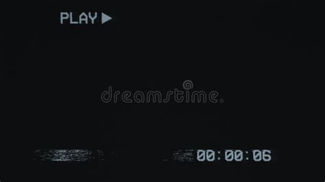 Playing An Old Poor Quality VHS Cassette Old Black Screen With Text PLAY And Timecode Stock