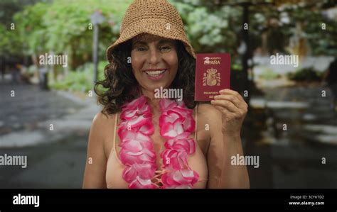 Hispanic Woman In Bikini With Hawaiian Lei Holds Spanish Passport
