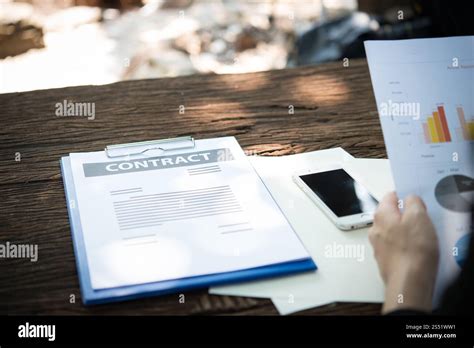 Business Woman Working With Documents Graphs Analyzing Investm