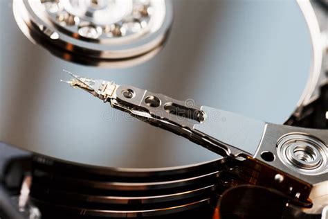 Disassembled Hard Drive From The Computer Hdd With Mirror Effect Opened Hard Drive From The