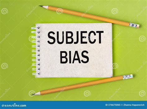 Subject Bias Words In Notepad On Pistachio Background And Crayons Royalty Free Stock
