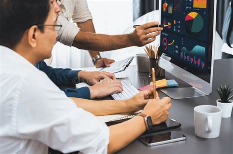 Data Analysts Team Of Office Worker Collaborate On Bi Dashboard