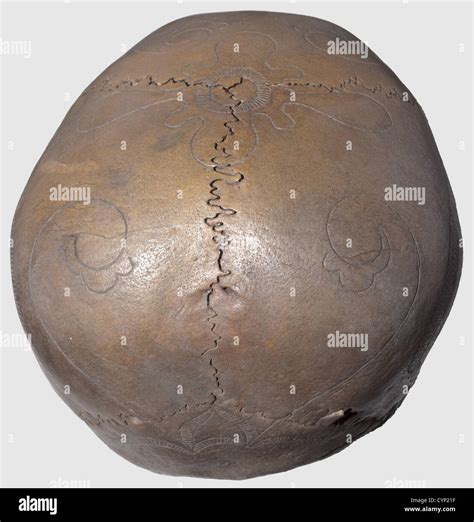 Borneo Ornamentally Engraved Skull Missing The Lower Jaw Hi Res Stock