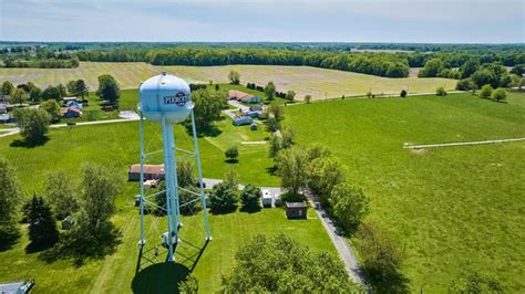 Premium Photo Aerial Pierceton Indiana Water Tower Rural Houses Farms