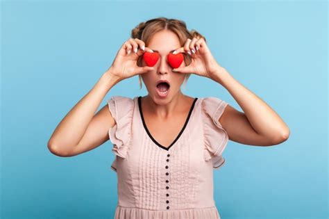 Premium Photo Happy Girl Standing Against Blue Background