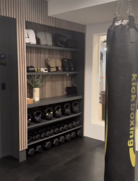 Minimalist Living Room With Punching Bag Gym Room Storage Ideas Gym