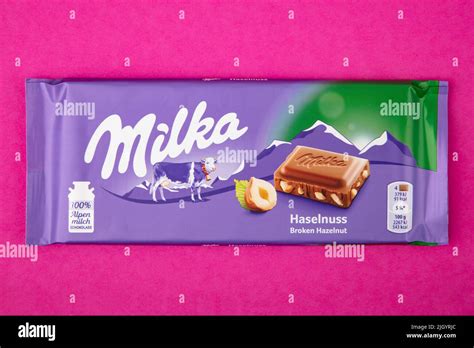 WETZLAR; GERMANY - 2022-04-11: Milka chocolate bar on purple background ...