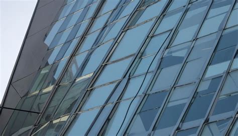Premium Photo An Angular Shot Of A Tall Glass Facade In Boston