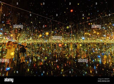 Visitors Inside The Infinity Mirror Room In Guggenheim Museum Bilbao