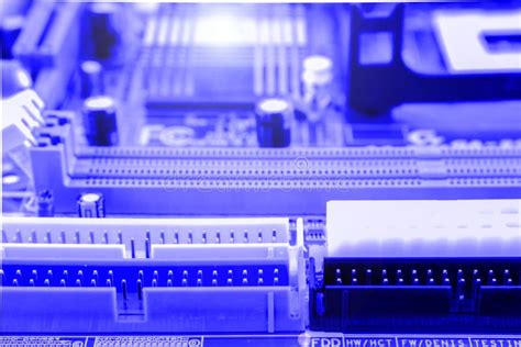 Electronics Components On Modern Pc Computer Motherboard With Ram Connector Slot And Cpu Socket