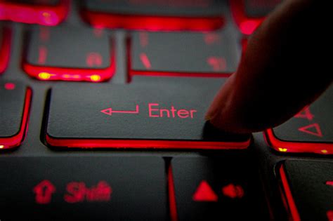 Hand Pressing Backspace Del Button On Computer And Red Led Image Stock