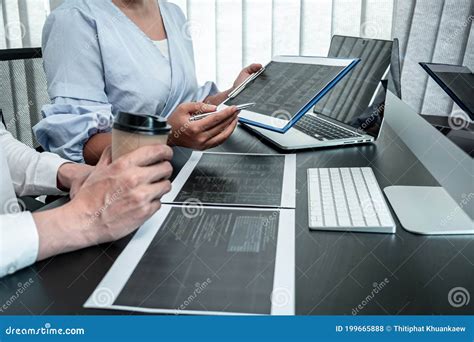 Team Of Developer Programmer Working On Coding Program Software Computer In Office Writing
