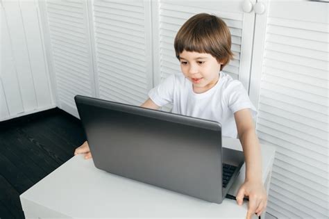 85000 Boy Using Computer Pictures