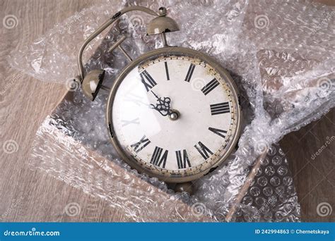 Vintage Alarm Clock With Bubble Wrap And Packaging Foam In Cardboard