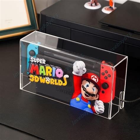 Switch防塵罩 透明保護罩 任天堂防塵殼 Switch防塵罩馬裏奧任天堂oled主機遊戲底座盒ns亞剋力 蝦皮購物