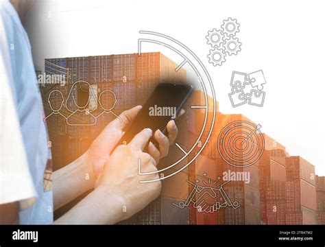 Businessman Manager Using Smartphone Monitoring And Controlling Workers