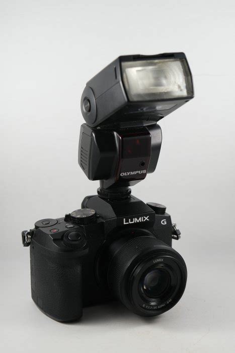 Olympus Panasonic Lumix G7 Lumix 25 Mm F 1 7 Mm Flash Fl 36 Mirrorless Camera Catawiki