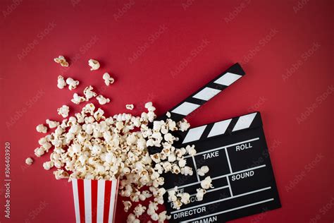 Movie Clapper Board And Popcorn Stock Photo Adobe Stock