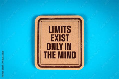 LIMITS EXIST ONLY IN THE MIND Cardboard Sticker With Text On A Blue Background Stock Photo
