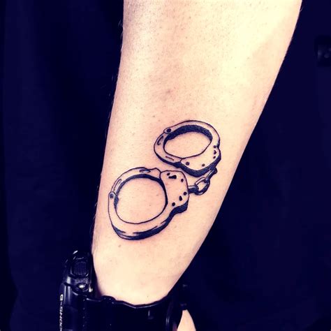 15 Timeless Handcuffs Tattoo Ideas For Unique Expression