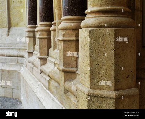 Light Color Porous Stone Column Base And Dark Shiny Smooth Decorative