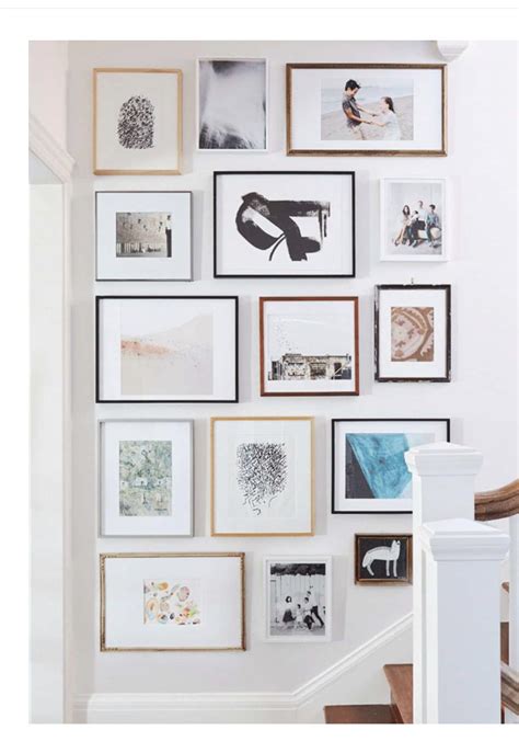How To Easily Hang Multiple Picture Frames Using The Brown Paper Method