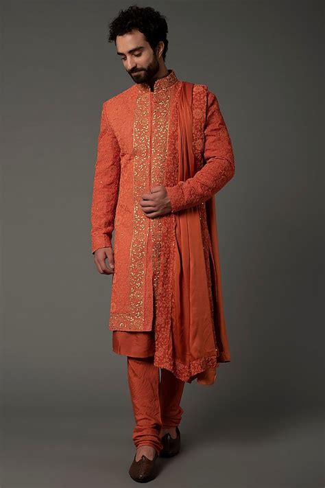 rust silk embroidered wedding sherwani set by naman ahuja at pernia s