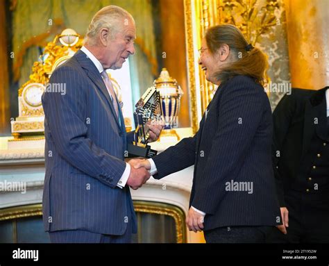 King Charles Iii Presents Dr Aihua Wang One Of A Team Of Four With The 2023 Queen Elizabeth