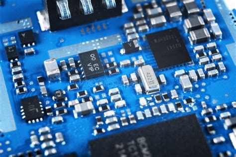 Macro Shot Of Circuit Board With Resistors Microchips And Electronic Components Computer