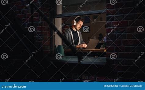 Software Developer Programming On A Laptop Late Night Male Specialist