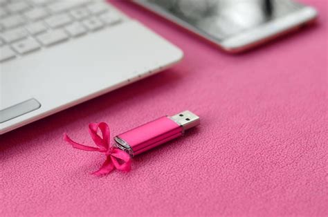 Premium Photo Close Up Of Usb Stick And Laptop On Table