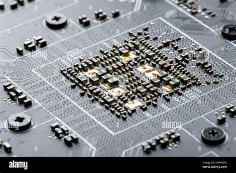 Electronic Pcb Printed Circuit Board In Macro Close Up With Transistors Circuitry And Electric