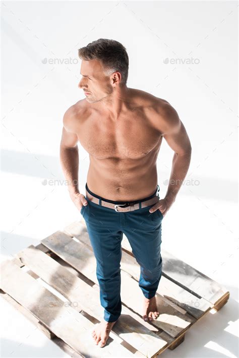 Guy Standing Up Shirtless