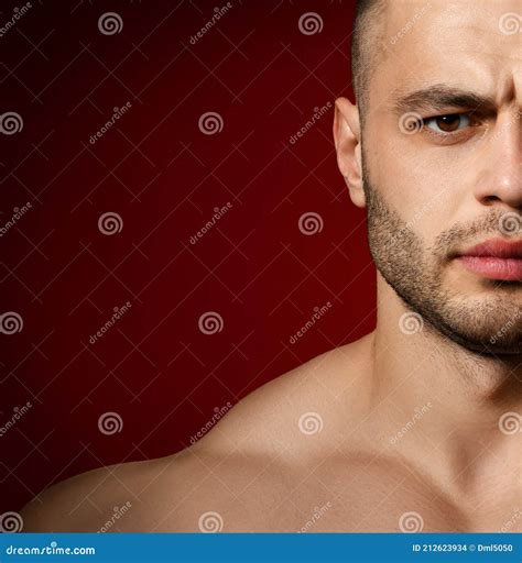 Closeup Portrait Of Brutal Unshaved Strong Young Man With Naked Pumped