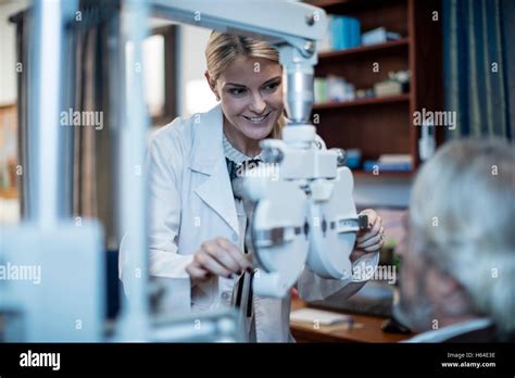 Female Optometrist Doing Eye Test With Patient Stock Photo Alamy