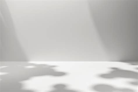 흰색 장면은 빈 스튜디오에서 햇볕이 잘 드는 그림자와 간단한 배경에 제품 디스플레이를 배경으로합니다 빈 받침대 또는 연단 플랫폼