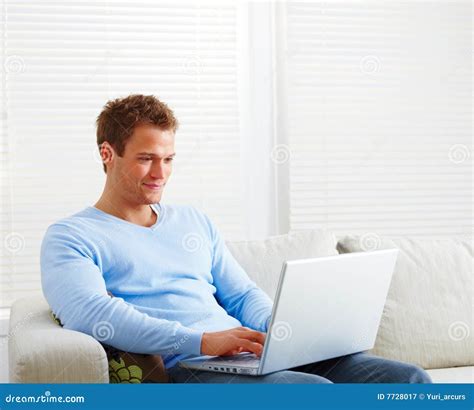 Man Sitting On Couch Using Laptop Computer Stock Image Image Of Person People 7728017