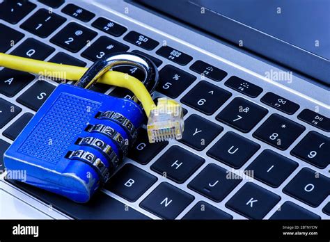 Network LAN Cable With Metal Key Code Lock With The Concept Of Data And Network Protection Stock