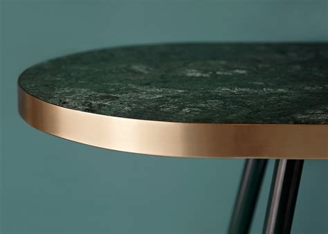 Bethan Grays Marble Band Tables Are Edged In Brushed Brass