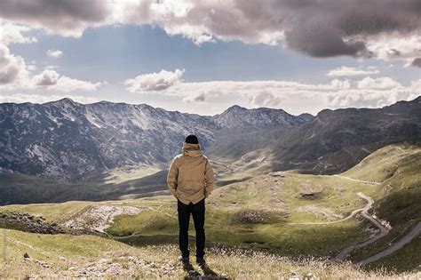 Man Looking At Green Valley And Mountains Durmitor Montenegro By