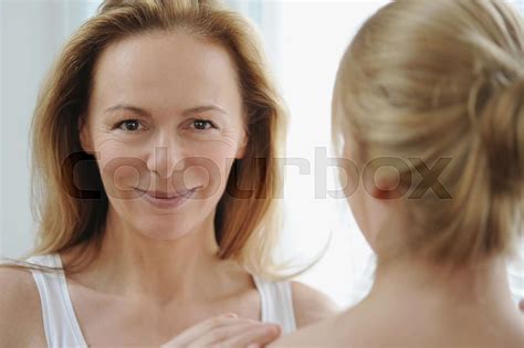 Mother And Daughter Standing Together Stock Image Colourbox