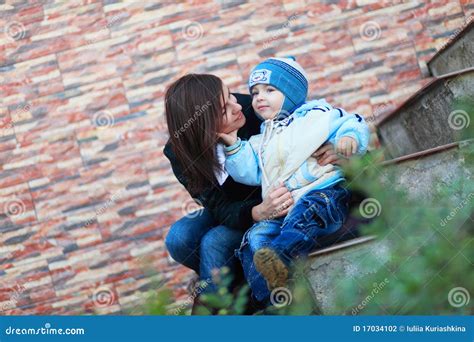Mother And Son Embrace Each Other Stock Photo Image Of Love Play